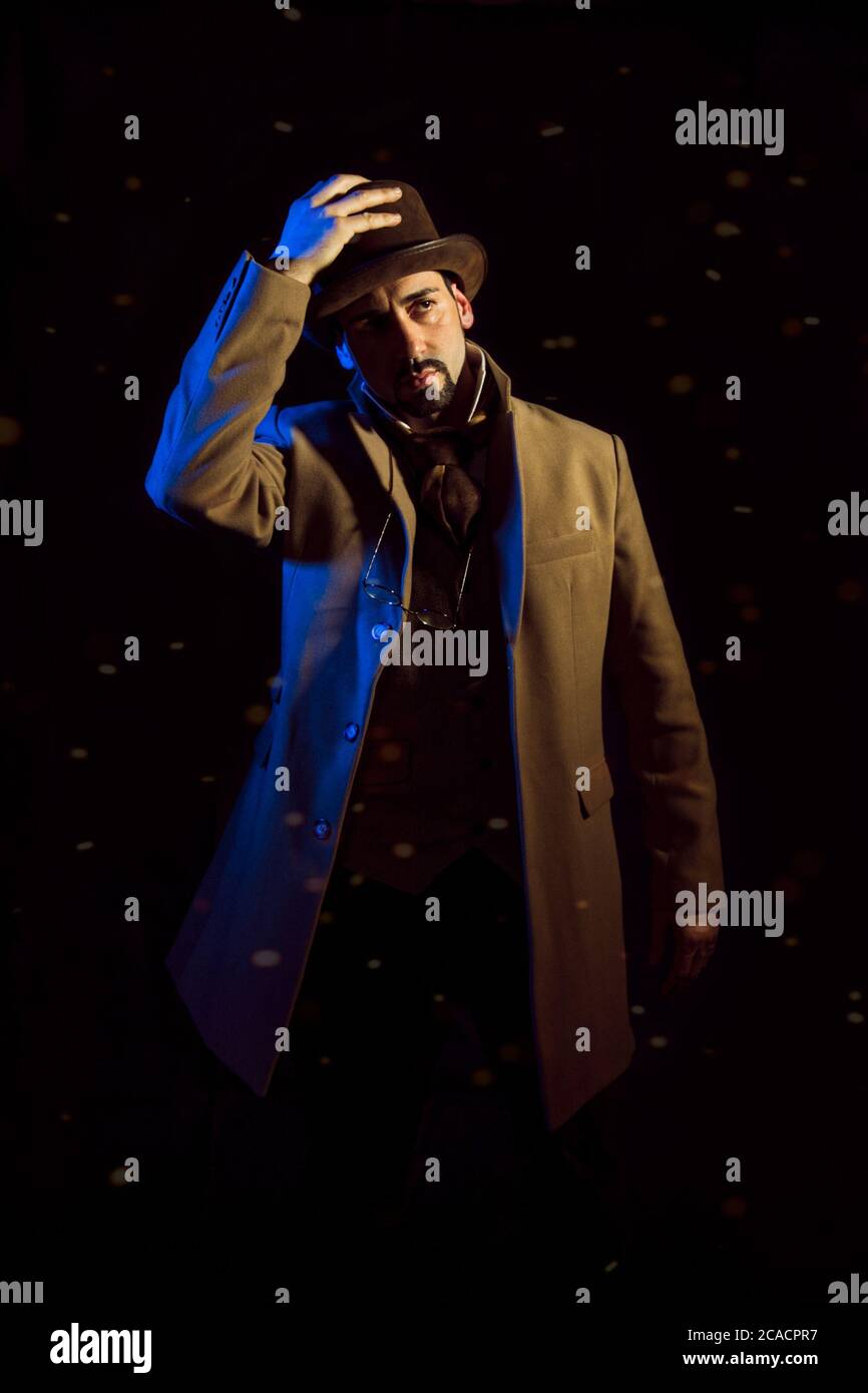 Portrait of a Victorian Man Standing with black background Stock Photo ...