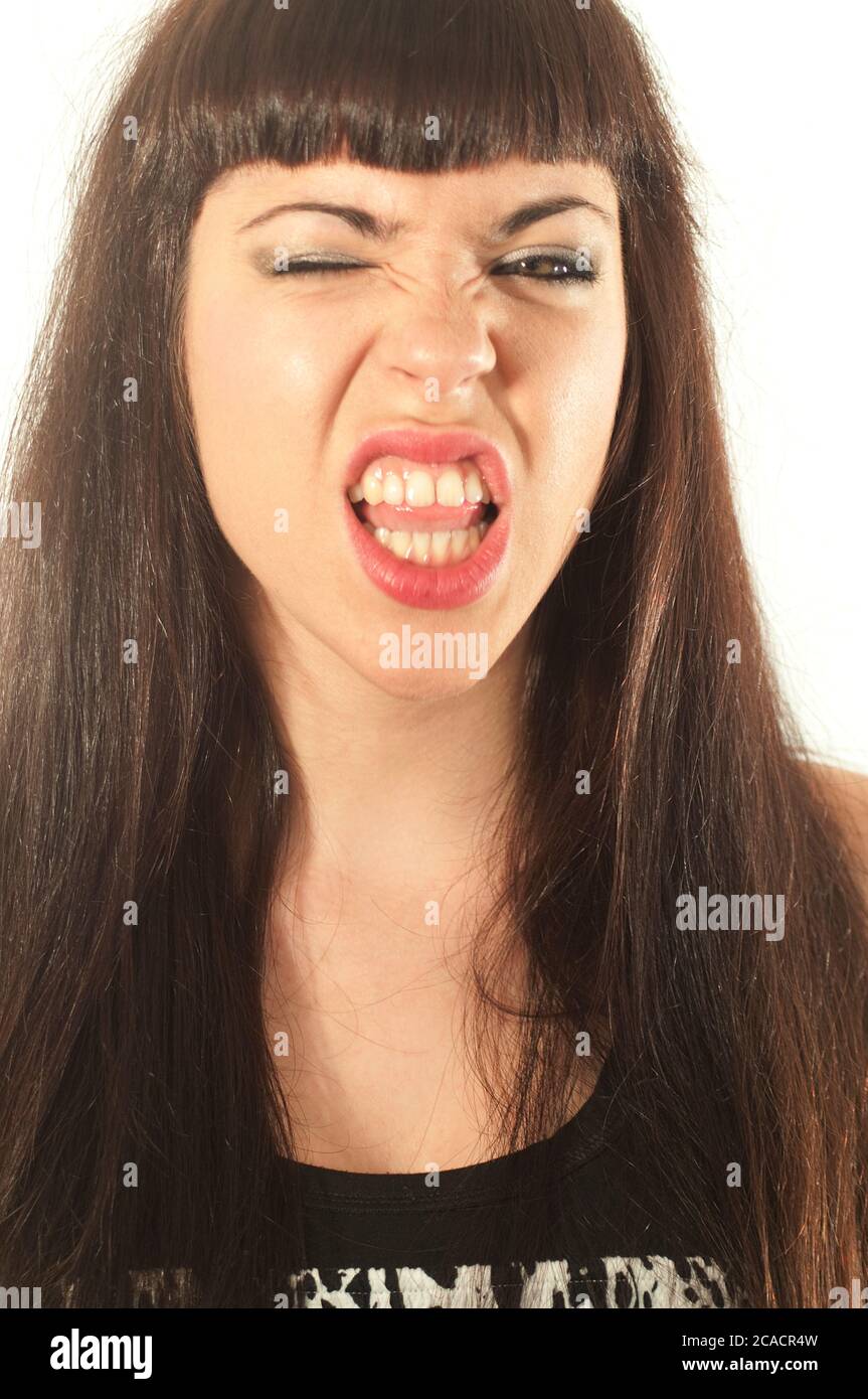 Young woman winking at the camera Stock Photo - Alamy