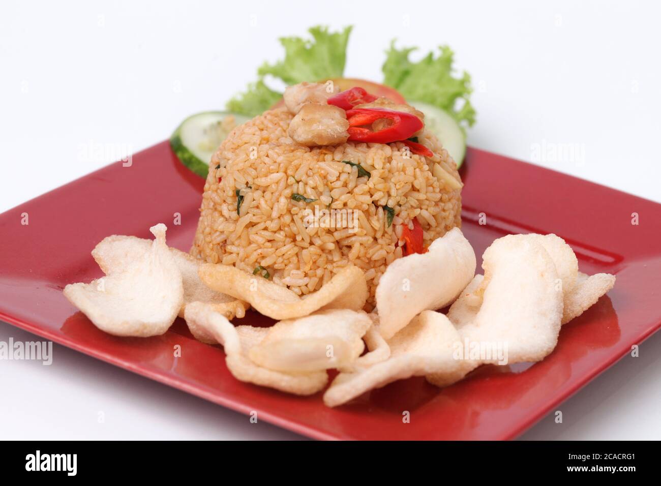 Indonesian dish : fried rice ( nasi goreng) served prawn crackers ...