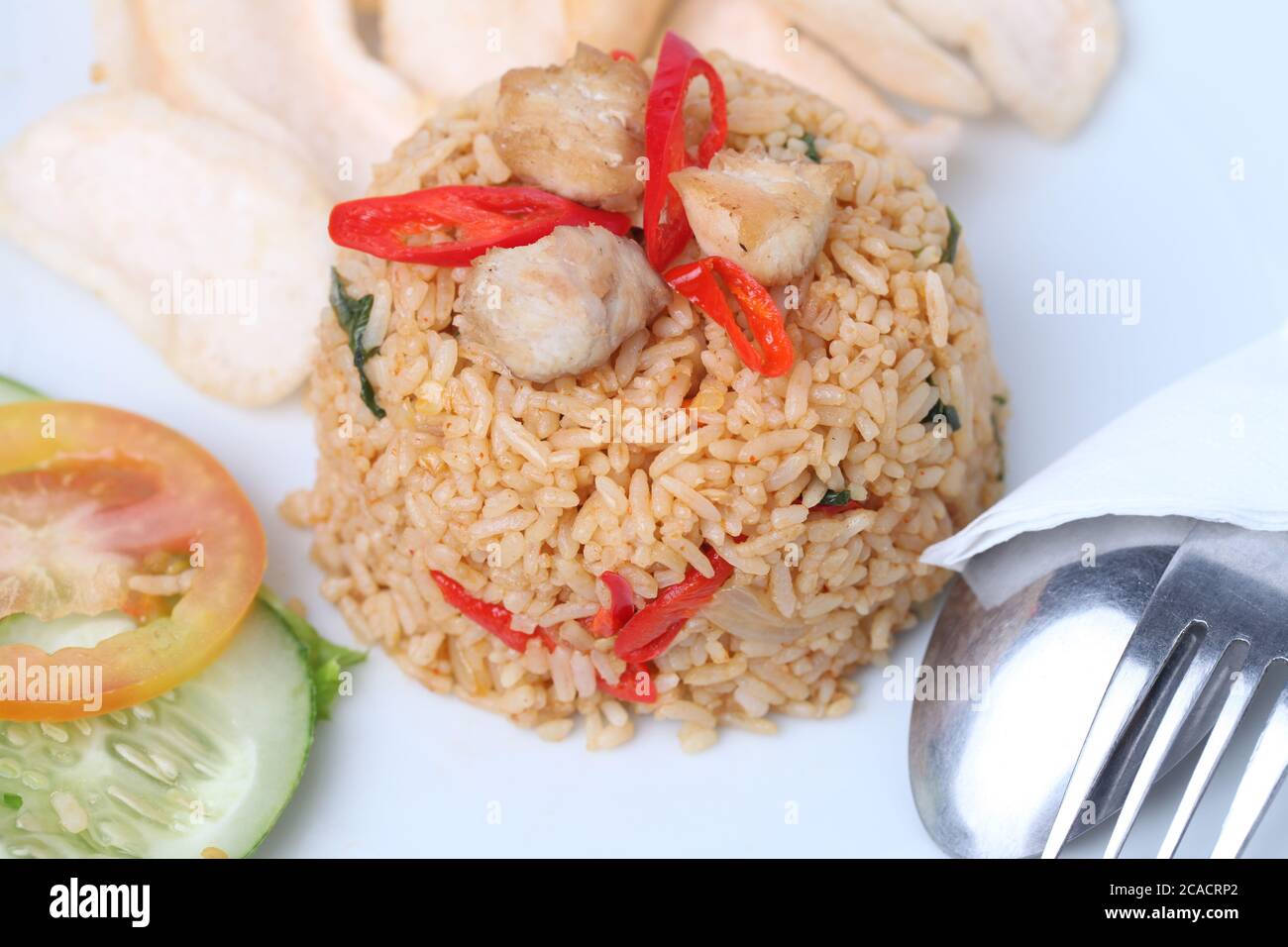 Indonesian dish : fried rice ( nasi goreng) served prawn crackers ...