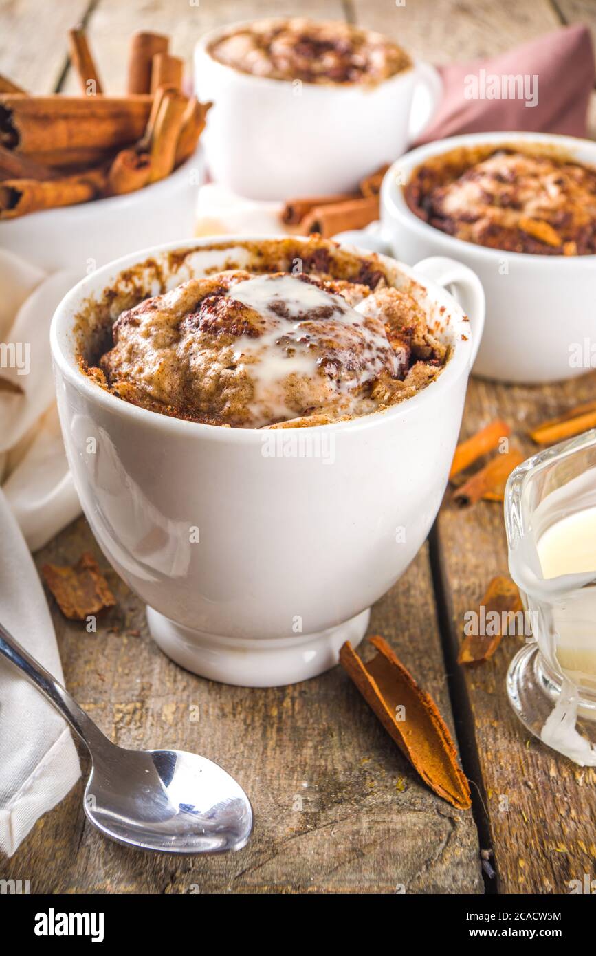 Cinnabon cake in mug. Fast simple microwave dessert idea, background ...