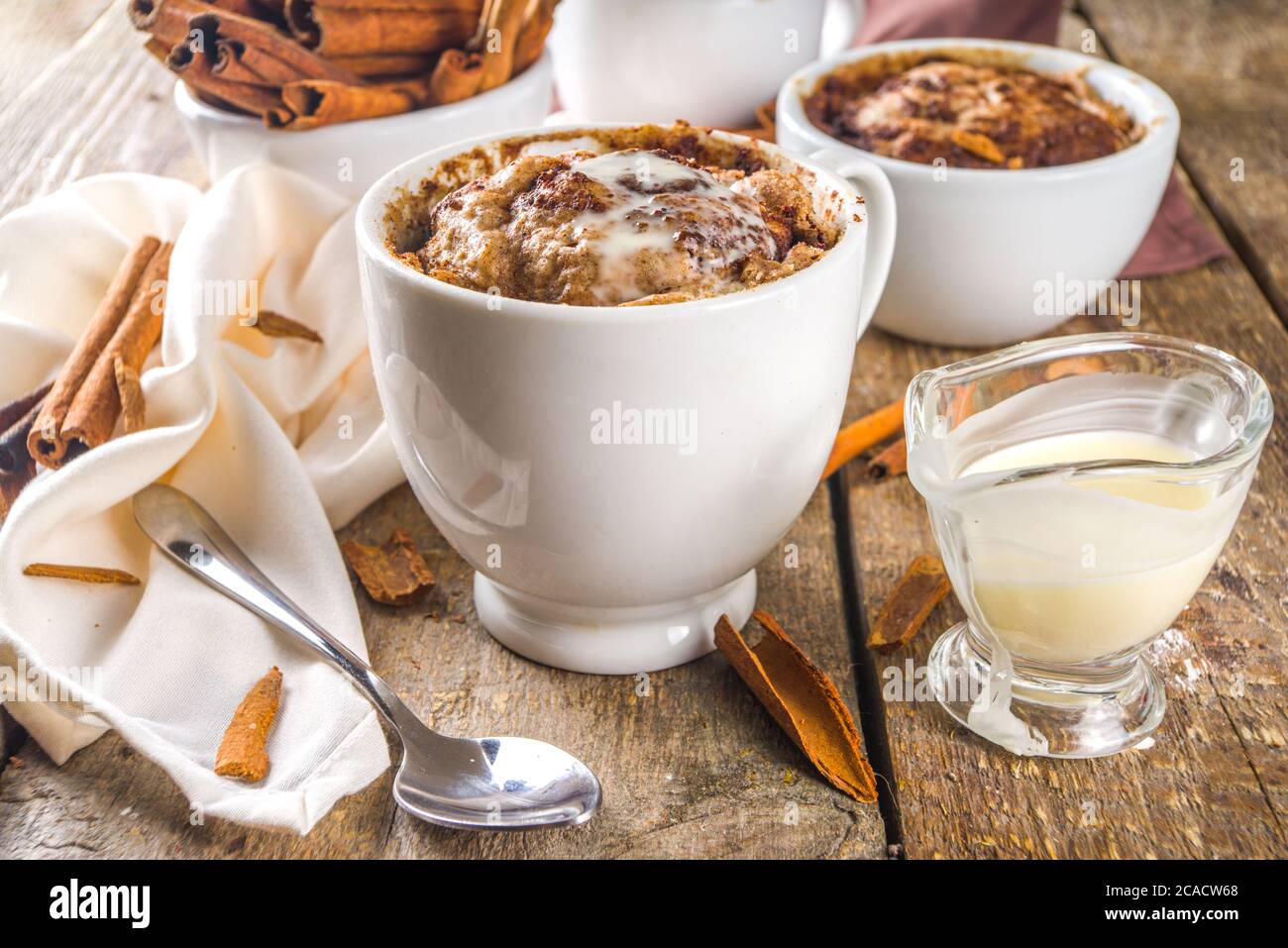Cinnabon cake in mug. Fast simple microwave dessert idea, background ...
