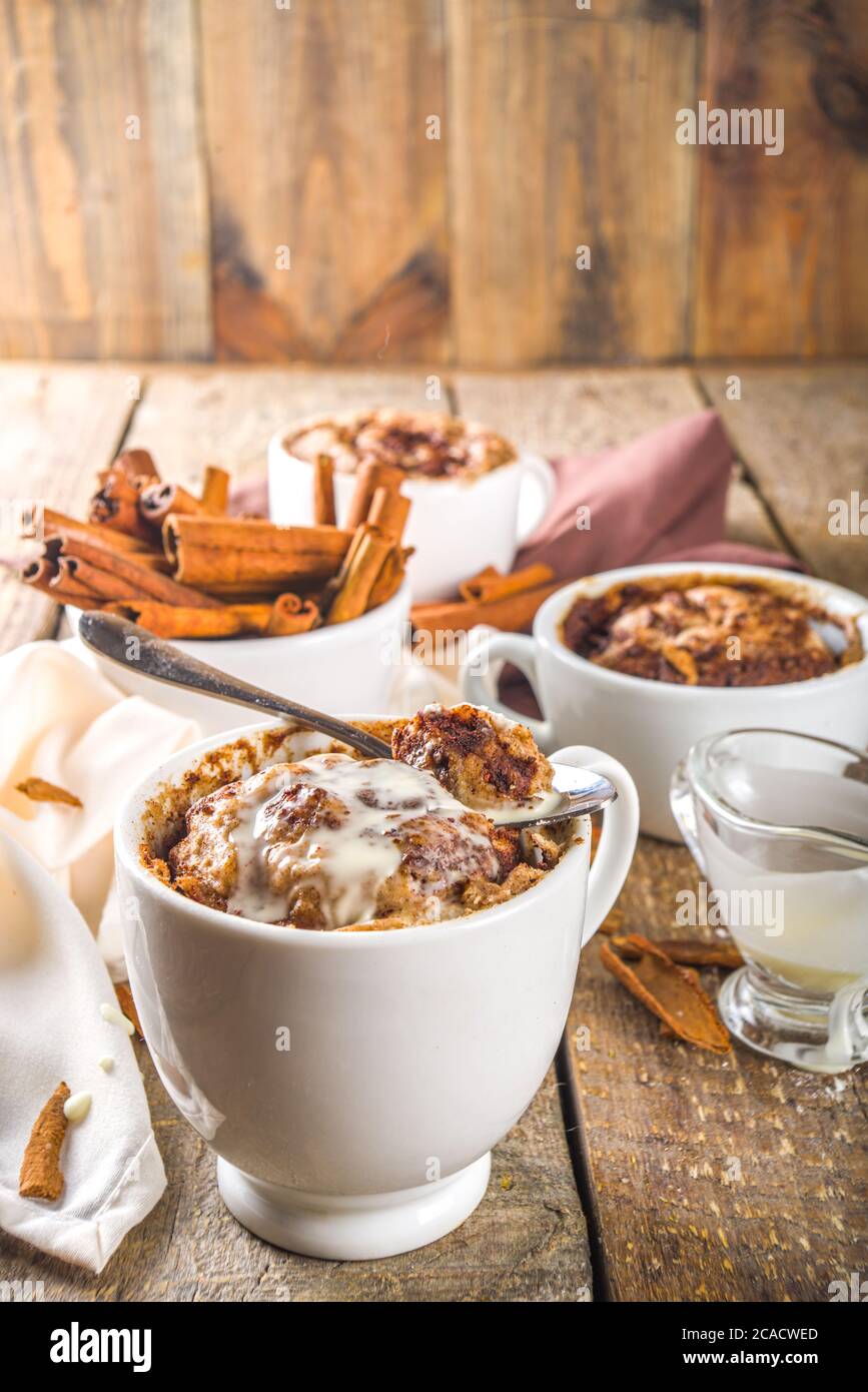 Cinnabon cake in mug. Fast simple microwave dessert idea, background ...