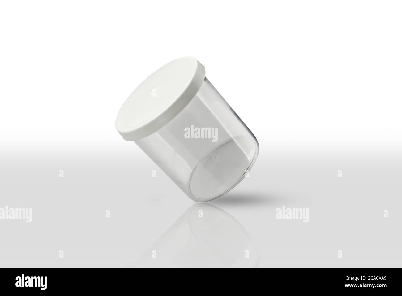 medical transparent plastic container with white lid, close up Stock ...
