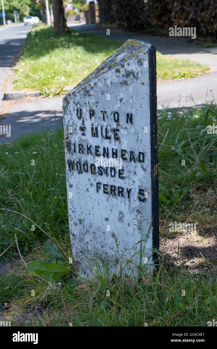 Stone mile marker by side of main road in Greasby Wirral May 2020 Stock ...