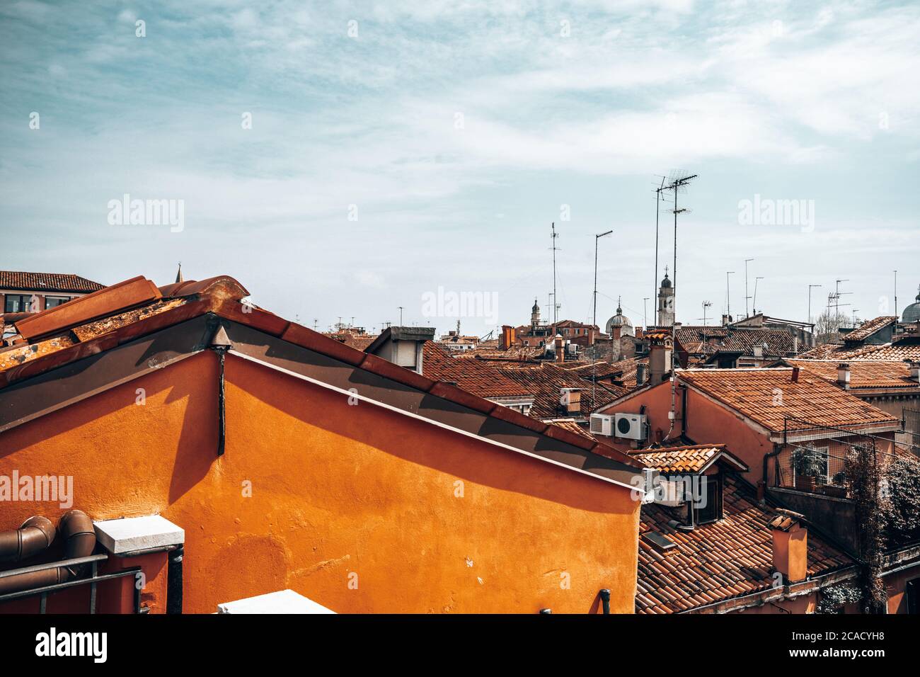High angle shot of the roofs of the medieval houses in Venice, Italy ...