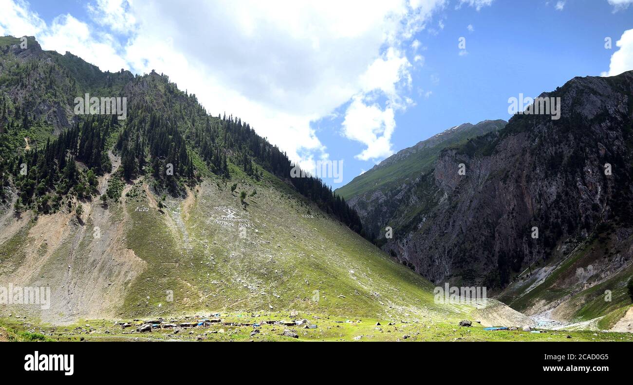 Hindu devotees visit during their pilgrimage from Baltal Base Camp to ...