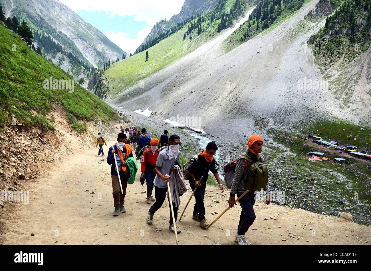 Hindu devotees visit during their pilgrimage from Baltal Base Camp to ...