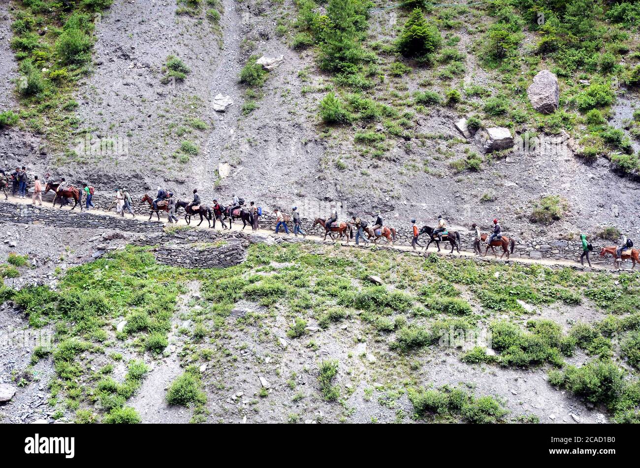 Hindu devotees visit during their pilgrimage from Baltal Base Camp to ...