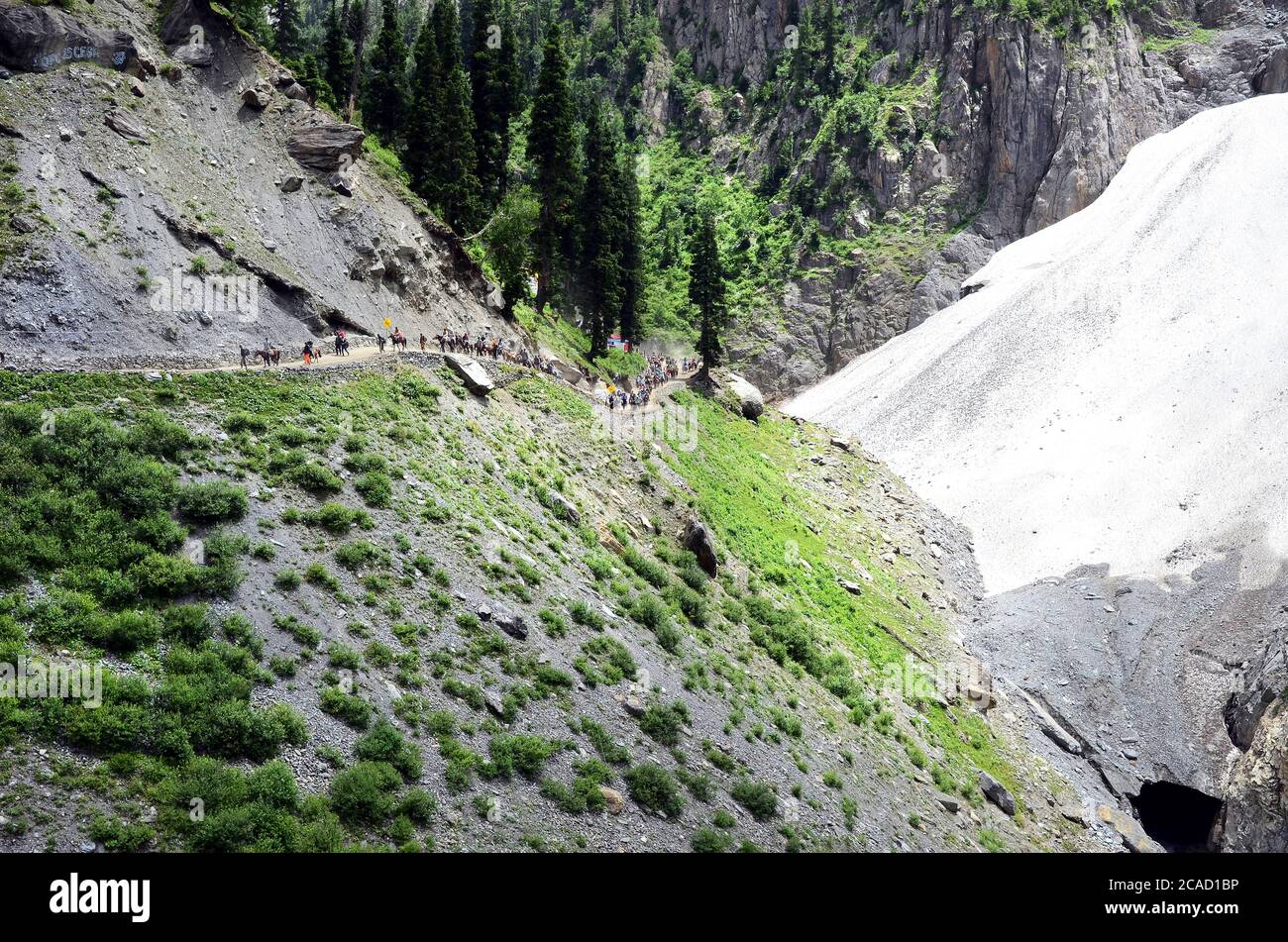 Hindu devotees visit during their pilgrimage from Baltal Base Camp to ...
