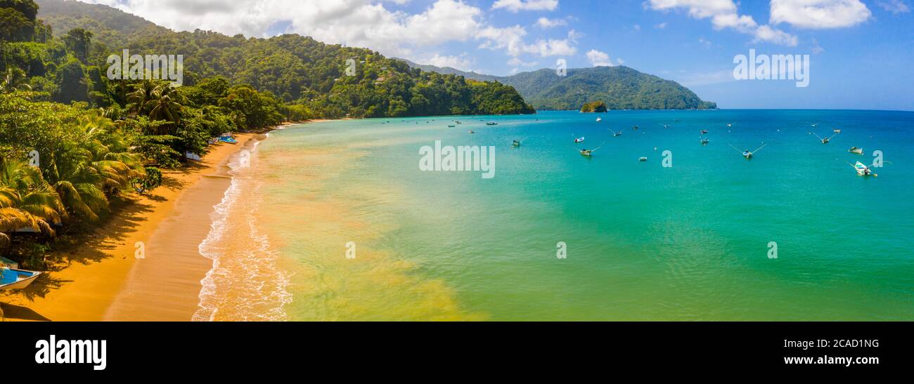 Panoramic shot of the beautiful seascape surrounded by greenery Stock ...