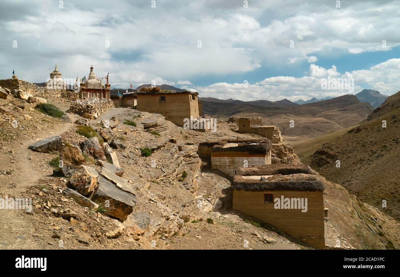 Isolated village of Tashigang with brick houses and Buddhist Stupas on ...