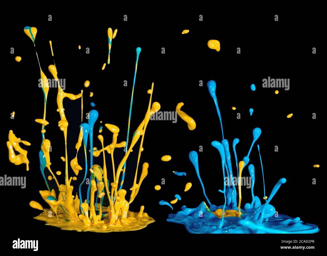 Explosion of multicolored paint caused by sound, on black background ...