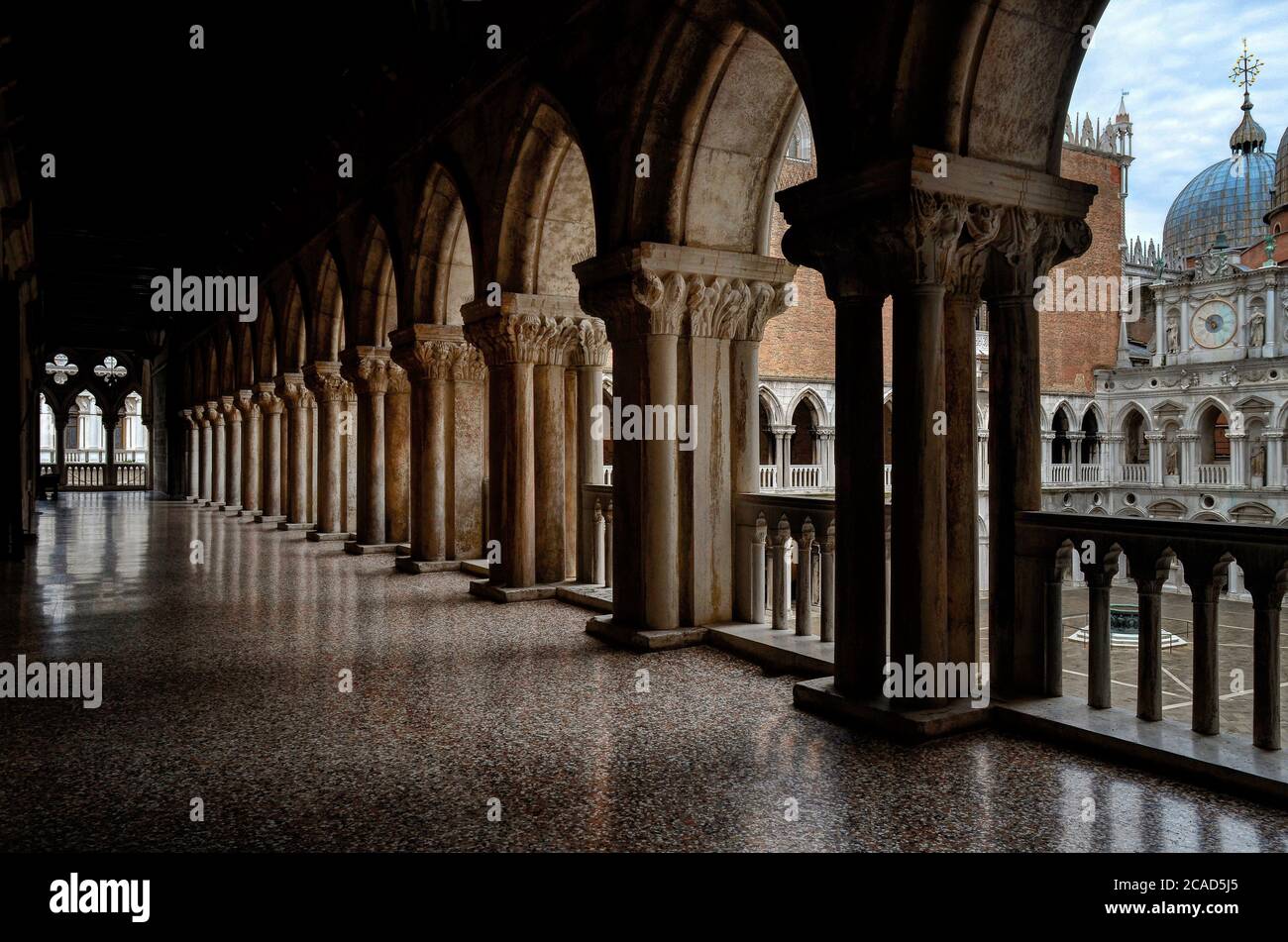 VENICE, ITALY - MAY 24, 2016 - Colonnade and balcony in the courtyard ...
