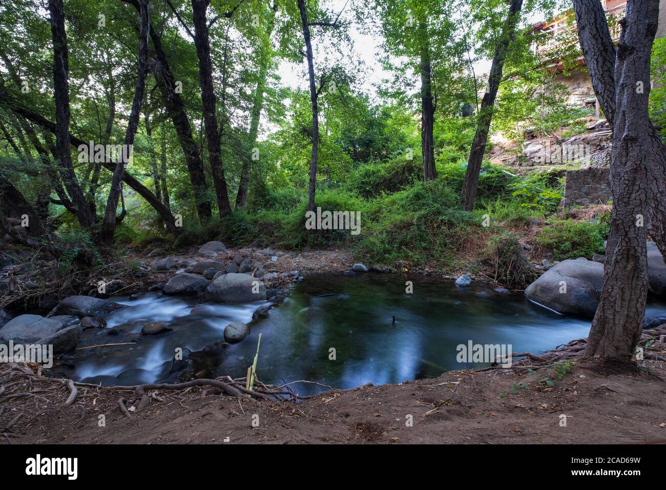 Pure water stream flowing over rocky mountain terrain in the Kakopetria ...