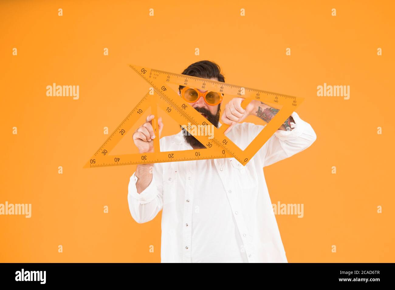 Student using measuring instrument. Engineering architecture faculty ...