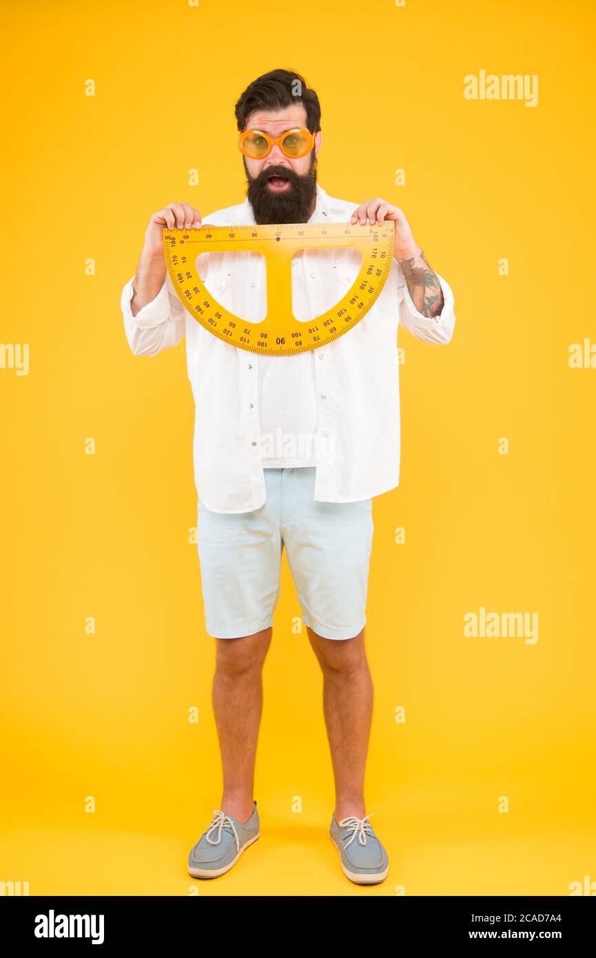 Student using measuring instrument. Barber hairdresser salon. Maintain ...