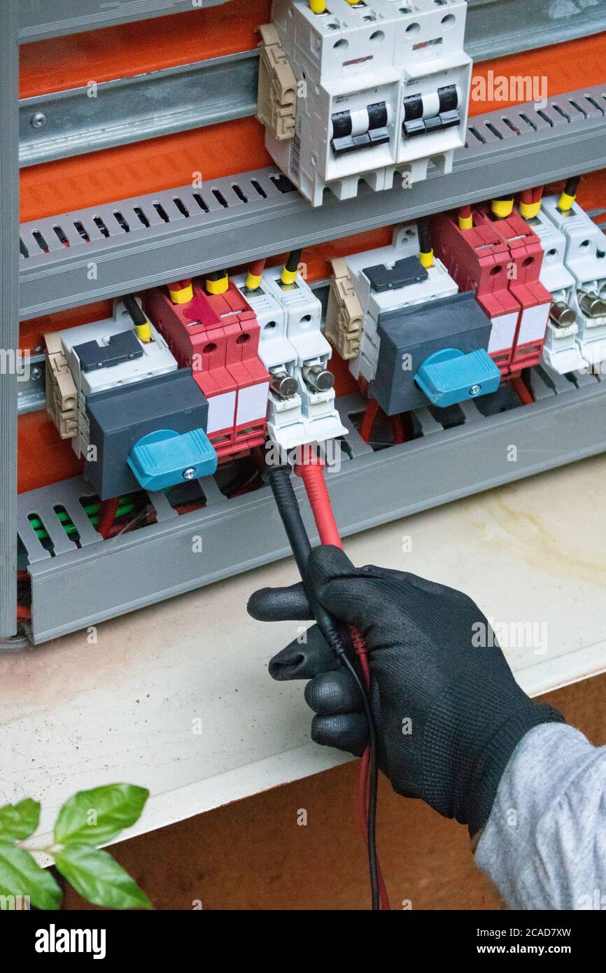 Cleaning and maintenance of the solar inverter Stock Photo - Alamy