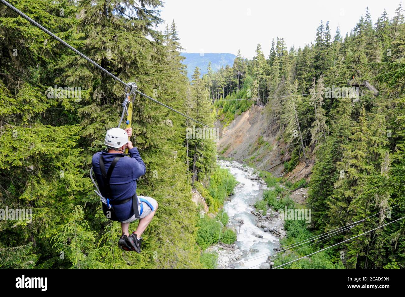 A tourist takes a higher and faster ride on the zip wire above the ...