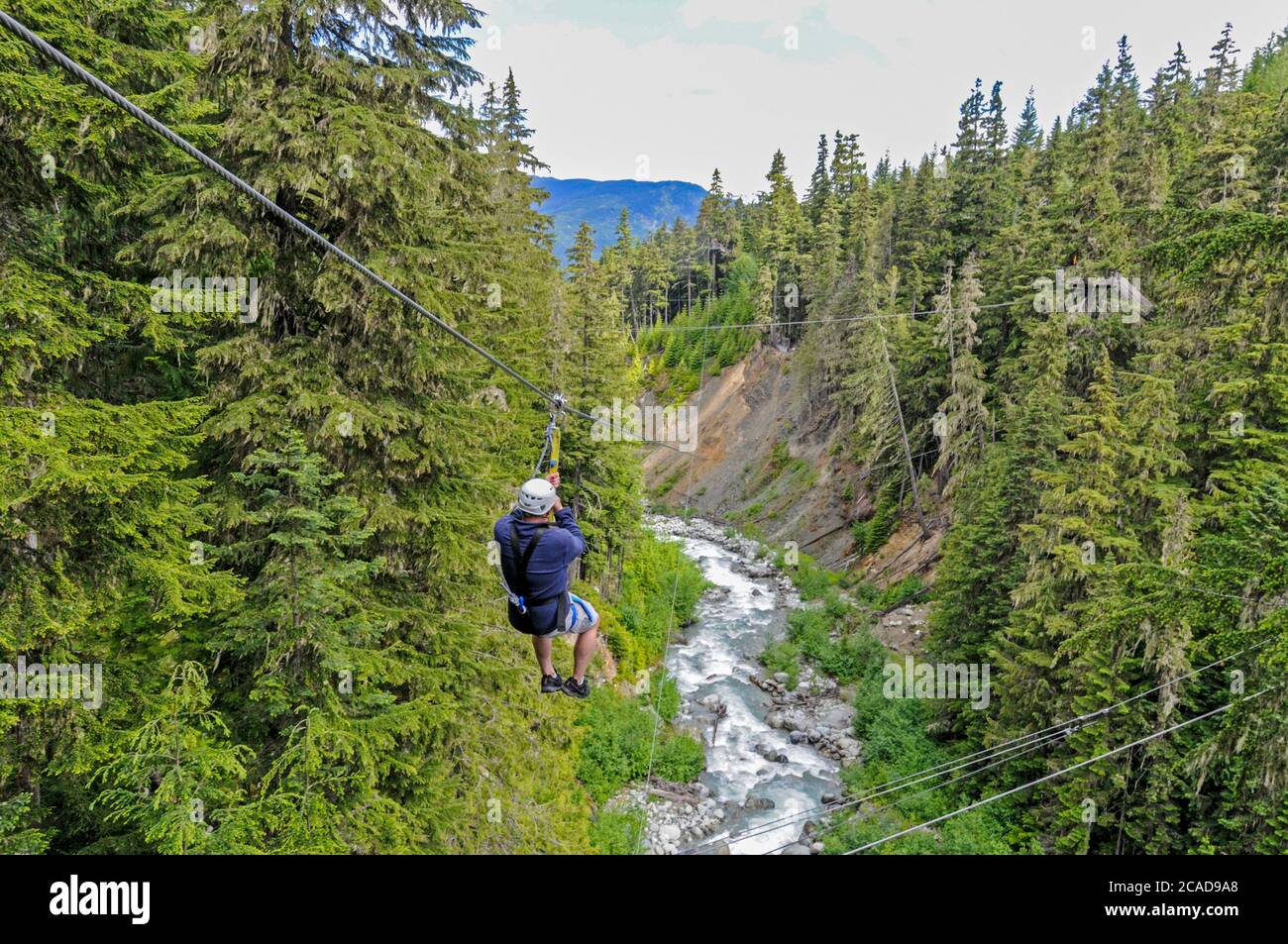 A tourist takes a higher and faster ride on the zip wire above the ...