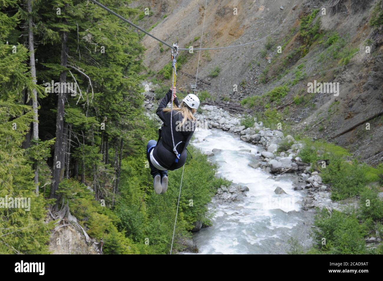 A tourist takes a higher and faster ride on the zip wire above the ...
