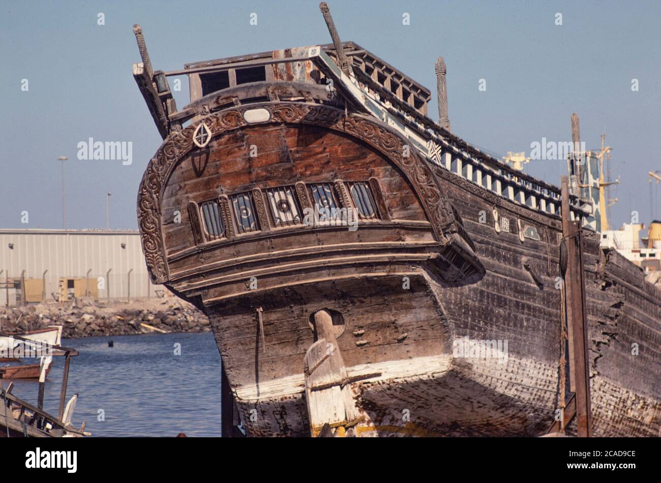 Highly decorated wooden hull of old arab dhow hi-res stock photography ...