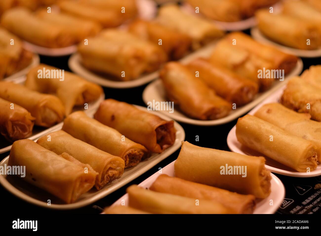 Golden spring rolls hi-res stock photography and images - Alamy