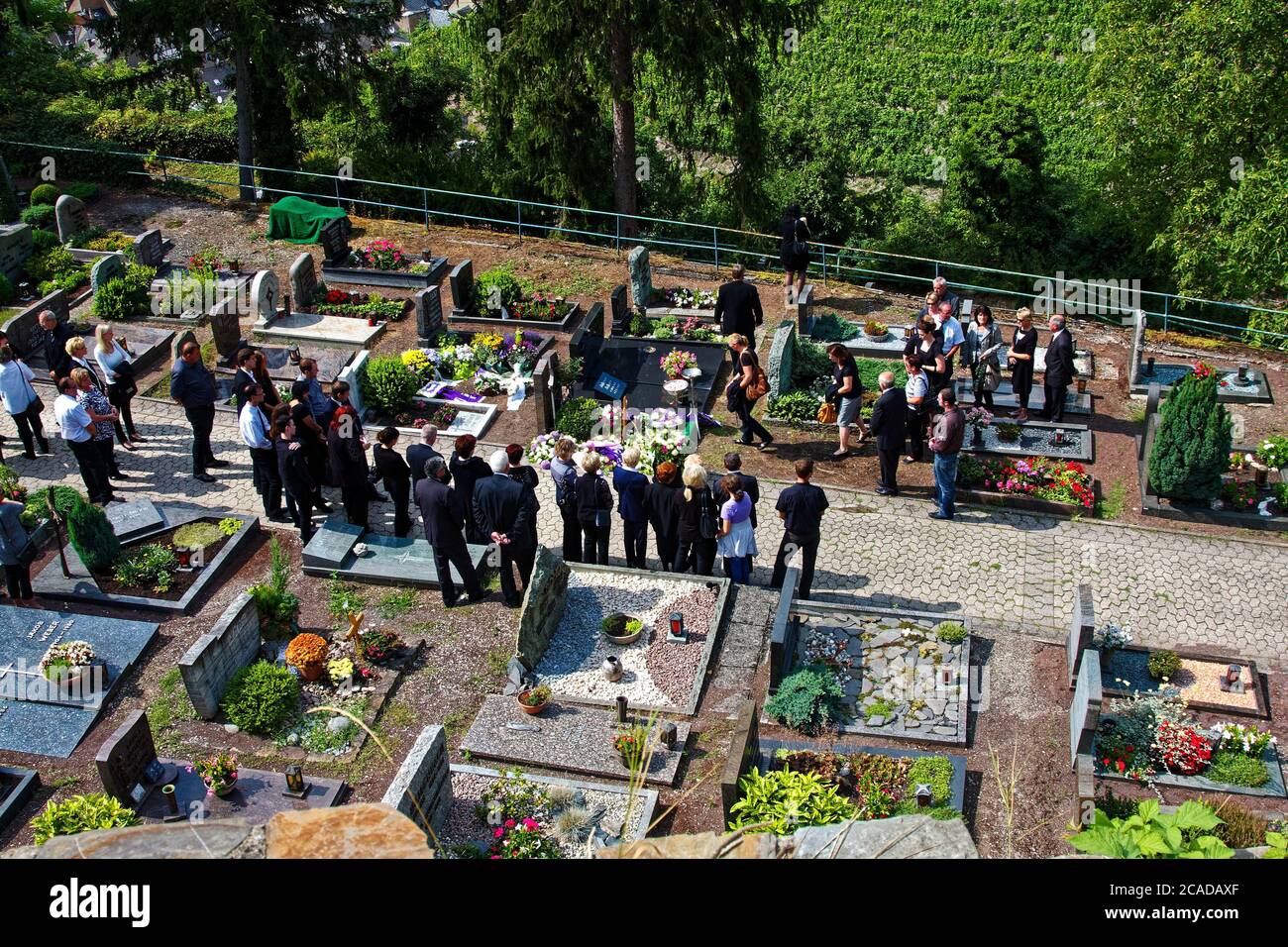 funeral, cemetery, aerial view, burial; people; graves; gravestones ...