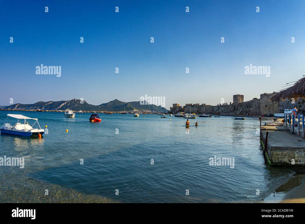 Summer view of the famous beach of Methoni town in Messinia region ...