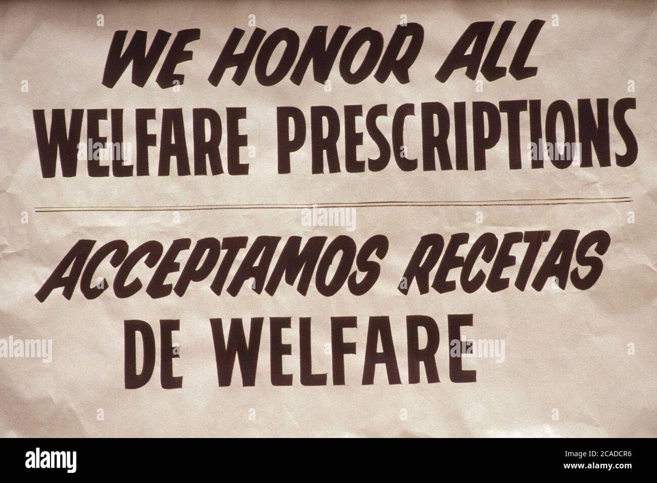 Bilingual signage stating the acceptance of all welfare prescriptions ...