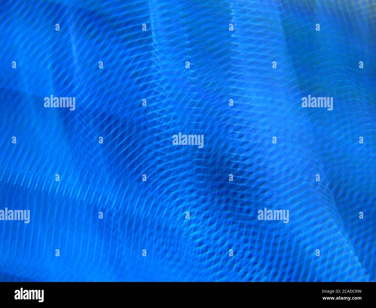 Blurred background with interlacing, refraction, and rotation effects ...