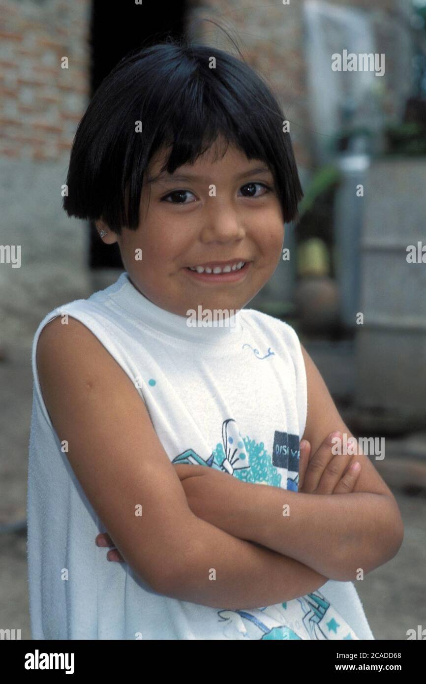 Portrait of young girl from low-income Campesino (farmer) family in San ...