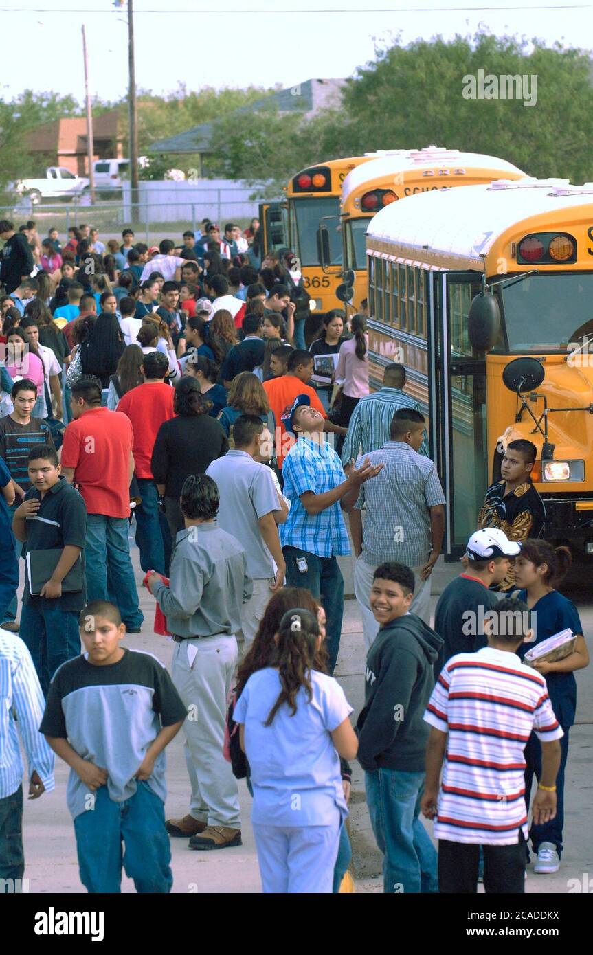 School buses leaving school hi-res stock photography and images - Alamy