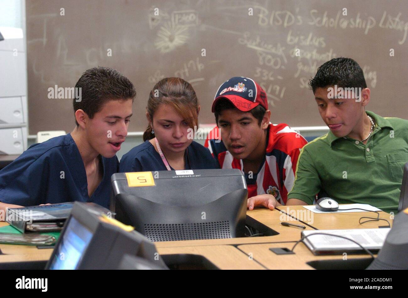 Teens using computers in computer lab hi-res stock photography and ...