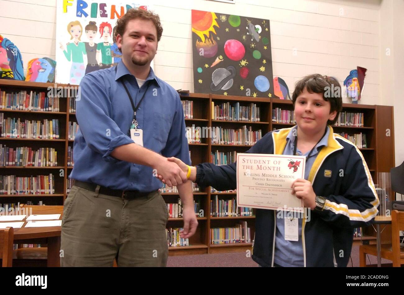 Sixth and seventh grade students receiving "Student of the Month ...