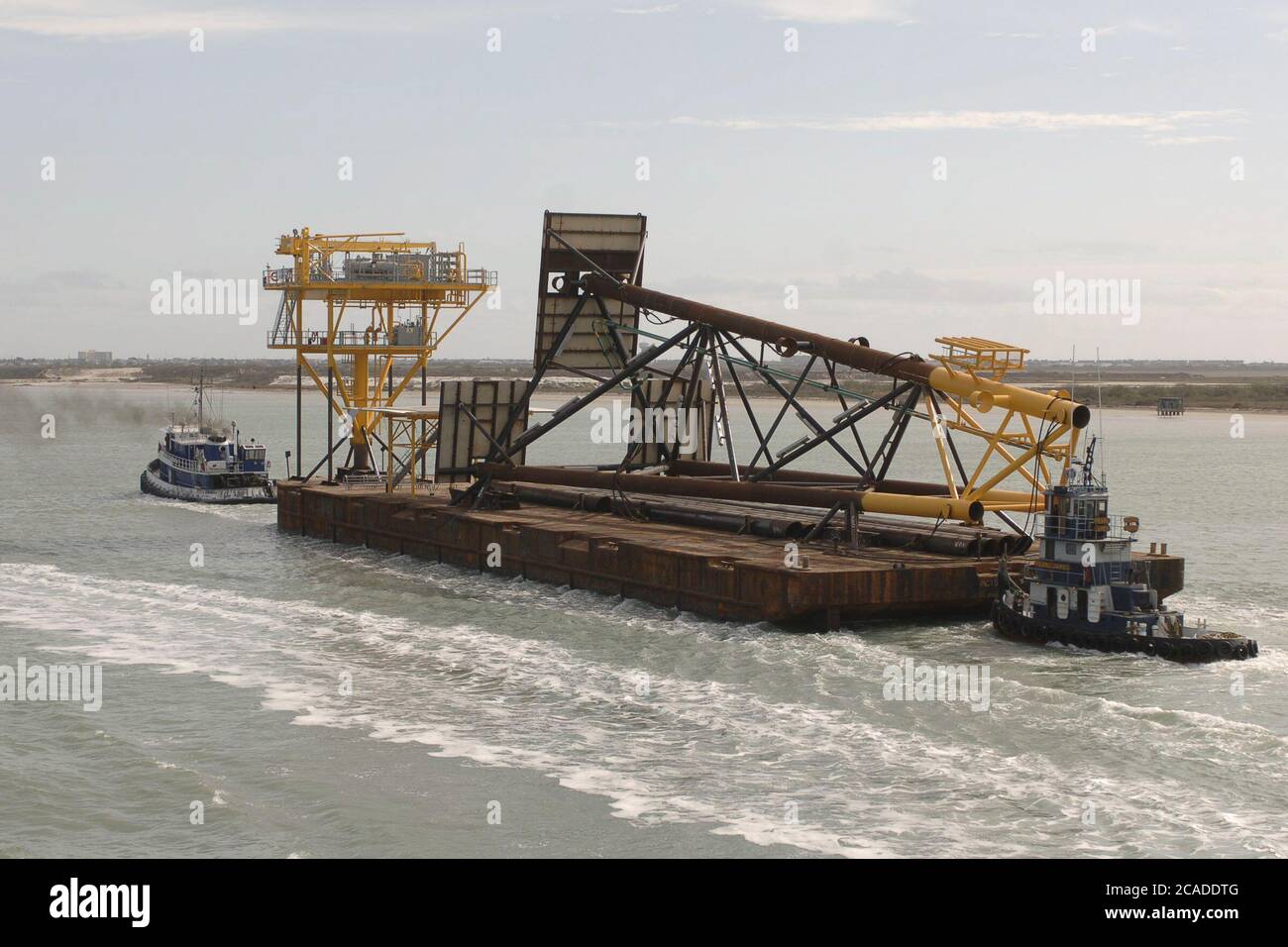 Port Aransas, Texas USA, January 15, 2006: A barge carrying a shallow ...