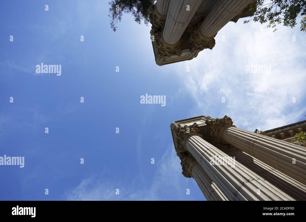 Low angle shot of pillars on a cloudy day background Stock Photo - Alamy