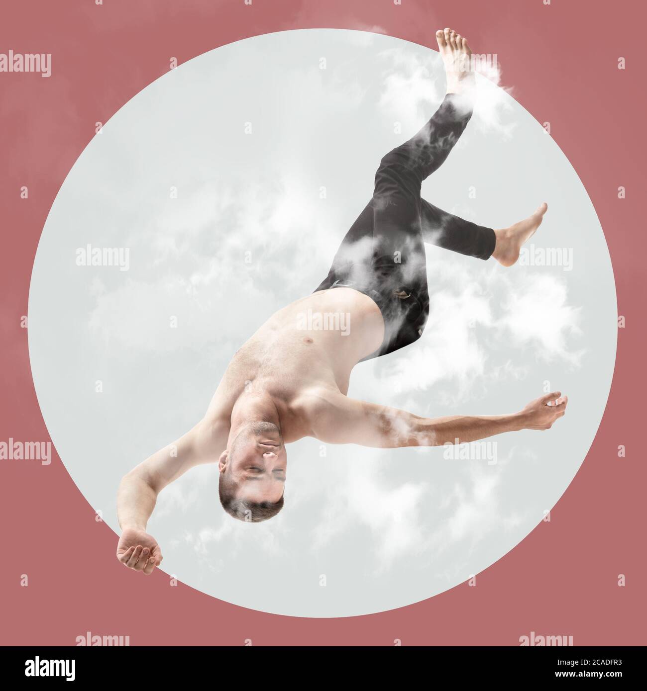 Mid-air beauty cought in moment. Full length shot of young man hovering ...