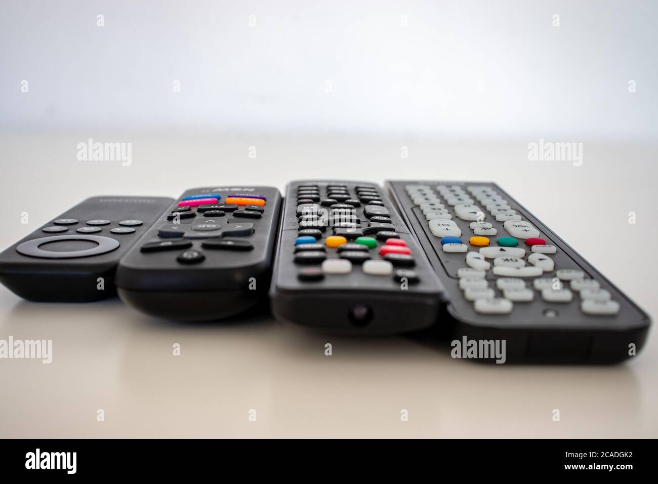 On a white background the remote controls, one for each device used ...