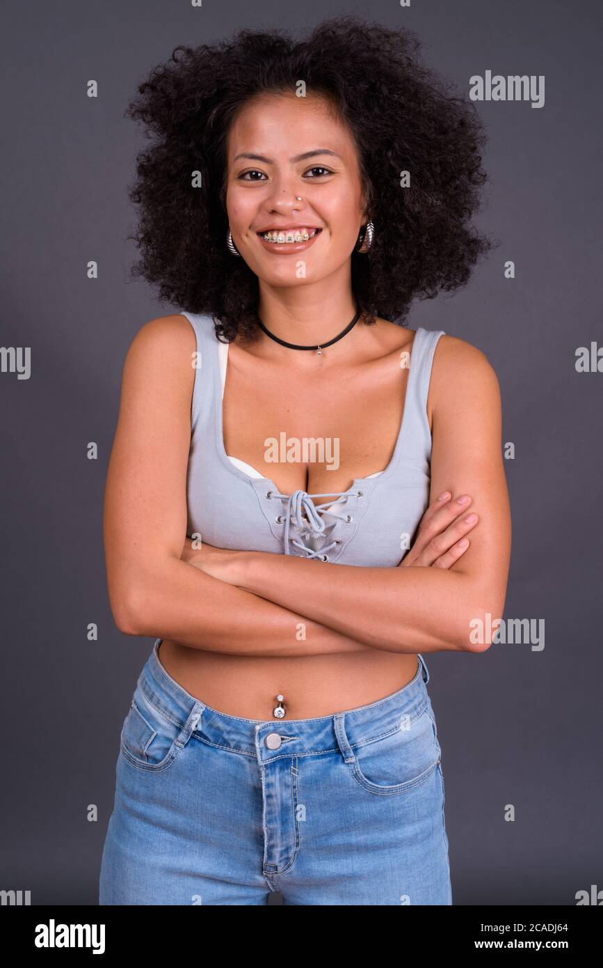 Happy black woman afro hi-res stock photography and images - Alamy