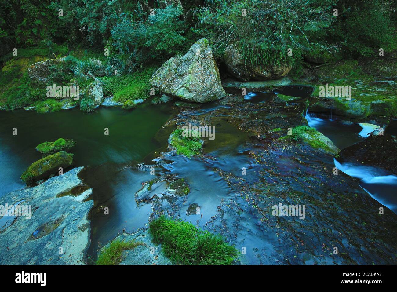 .River landscape with rocks and moss in the valley Stock Photo - Alamy