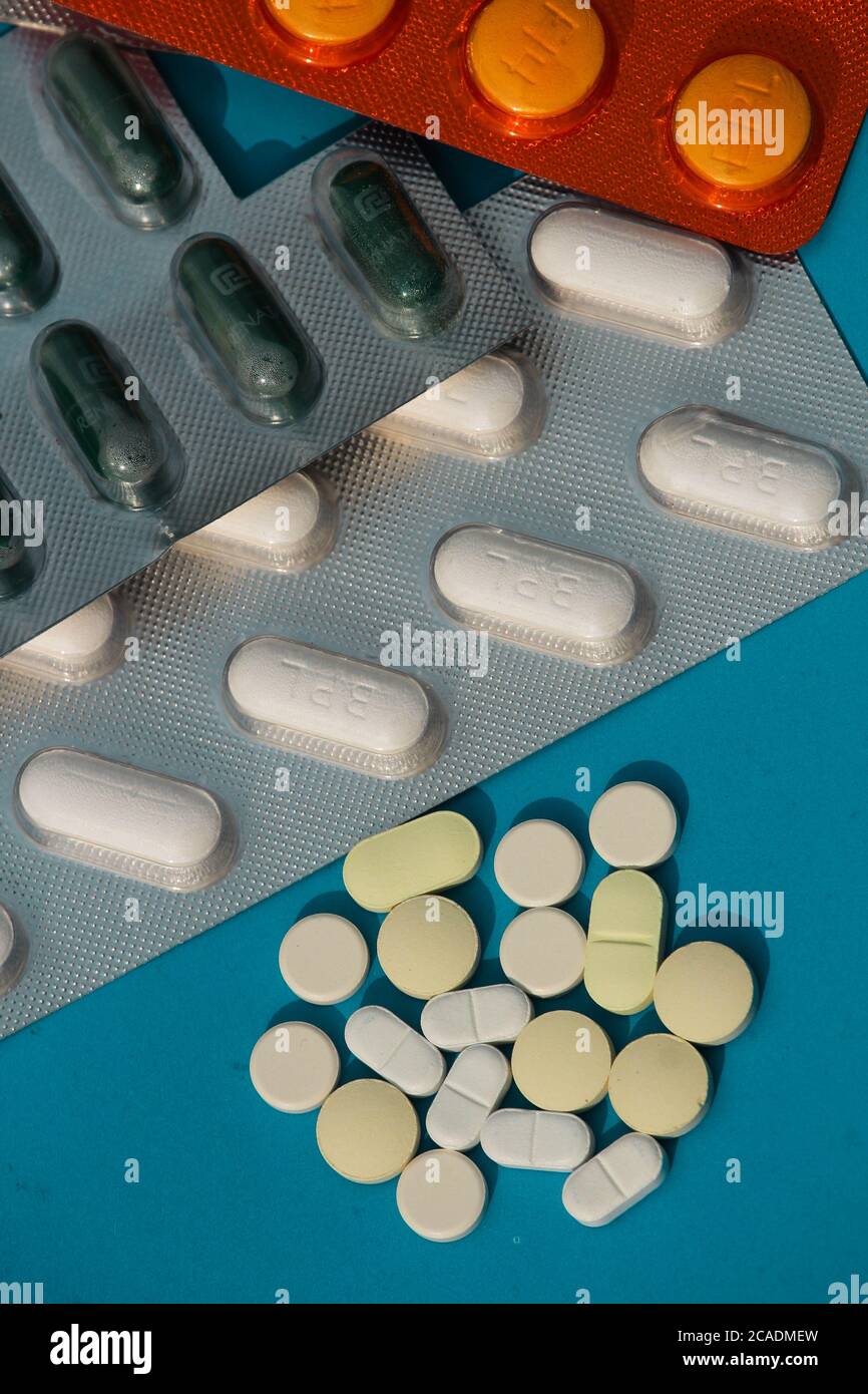 Assorted pharmaceutical medicine tablets & capsules. Various medicine ...