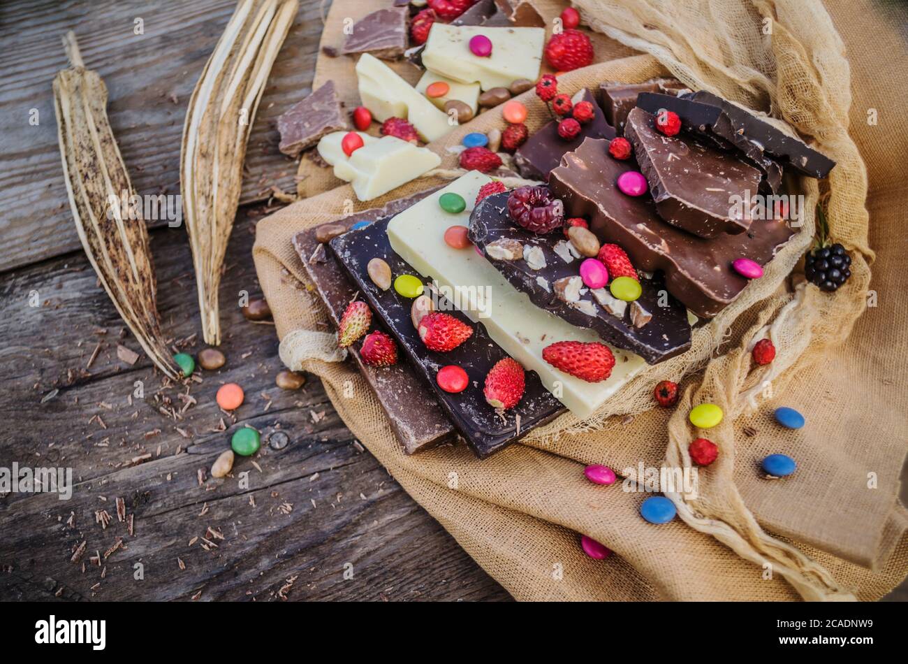 Chocolate blocks stack with different kind of chocolate Stock Photo - Alamy