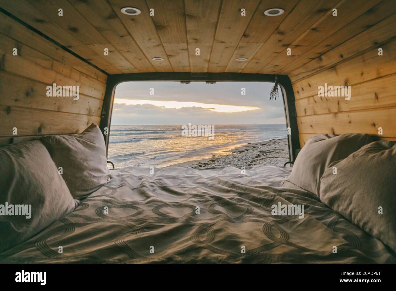 Views of sunset from open doors of sprinter van in Baja, Mexico Stock ...