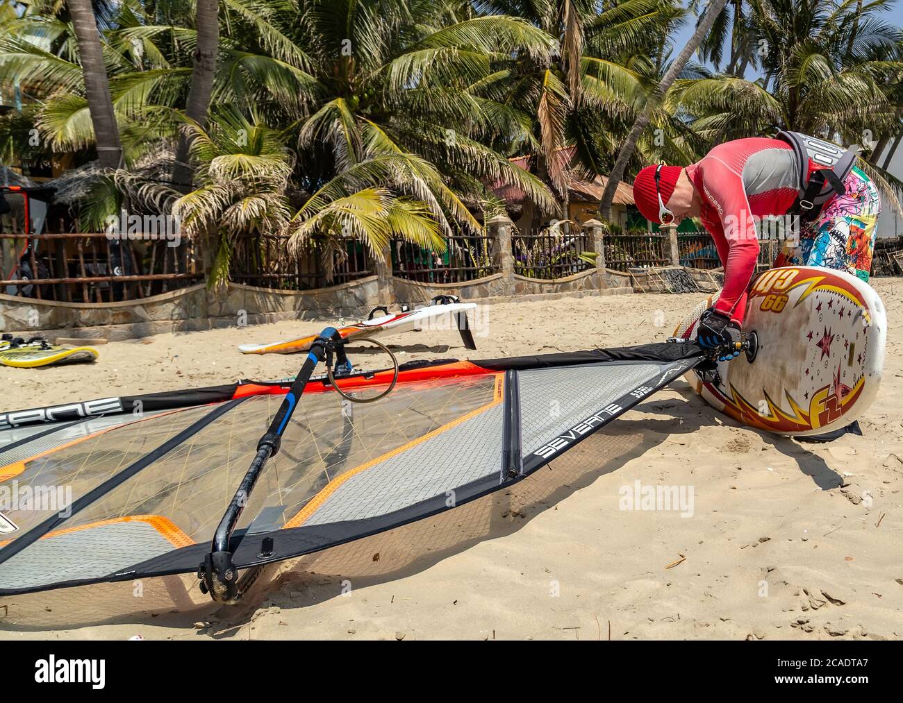 Mui Ne, Phan Thiet, Vietnam - Feb 16, 2015: Windsurfing surface water ...