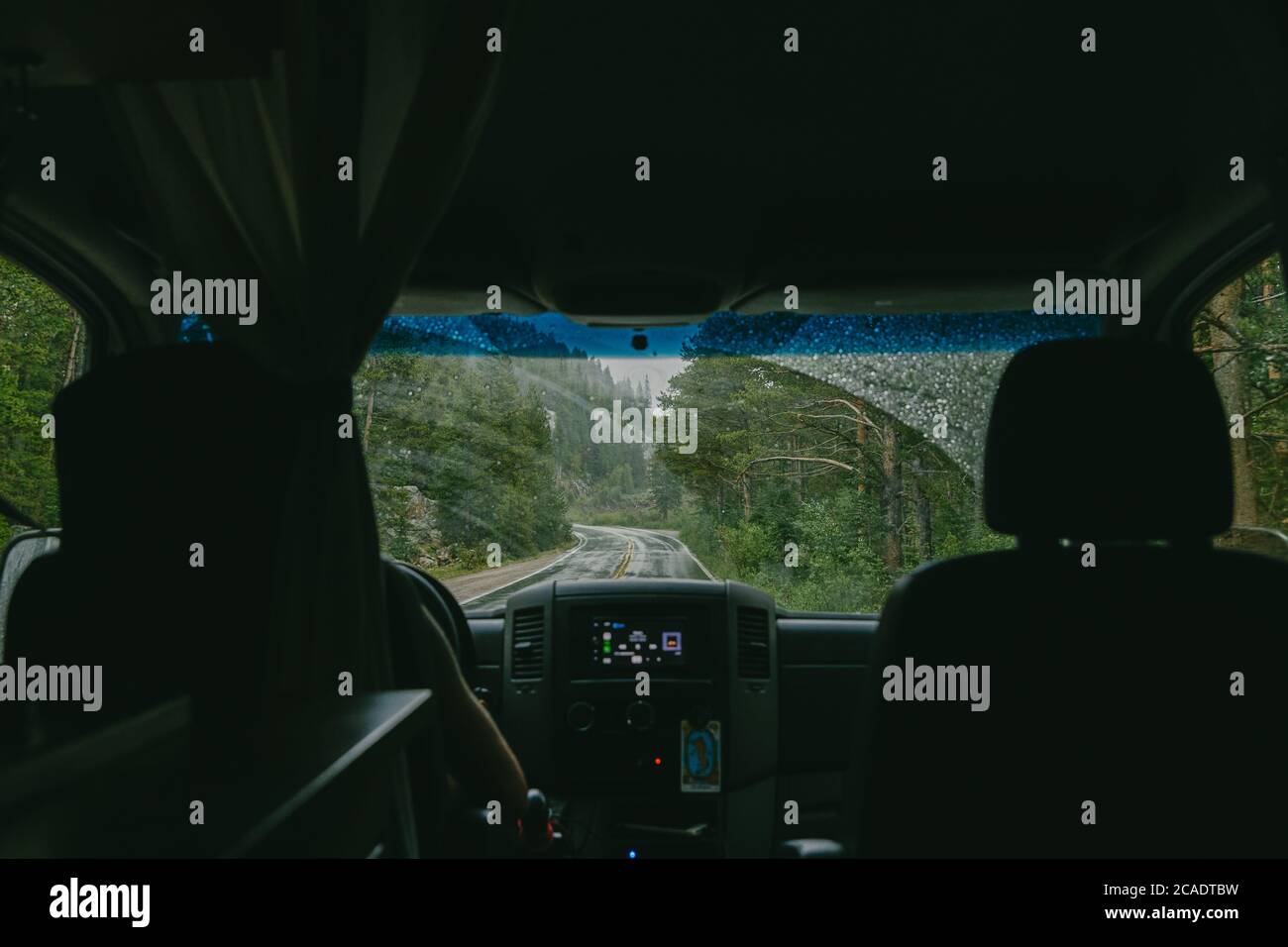 View of open road through windshield of camper van Stock Photo - Alamy