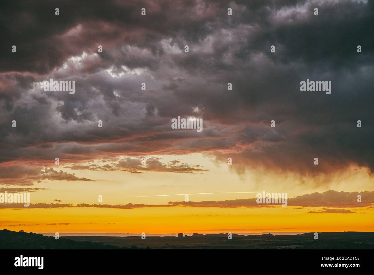 Storm clouds during sunset over desert landscape in Moab, Utah Stock ...