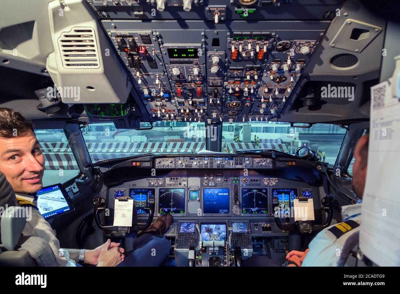 DUBAI, UAE - JANUARY 26, 2016: Captain pilot and co-pilot in the Flight ...