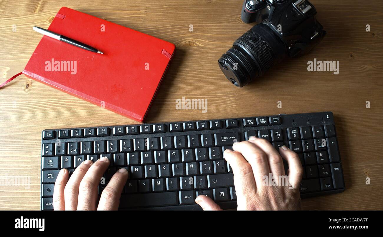 Top view of a male hand types text on the keyboard Stock Photo - Alamy
