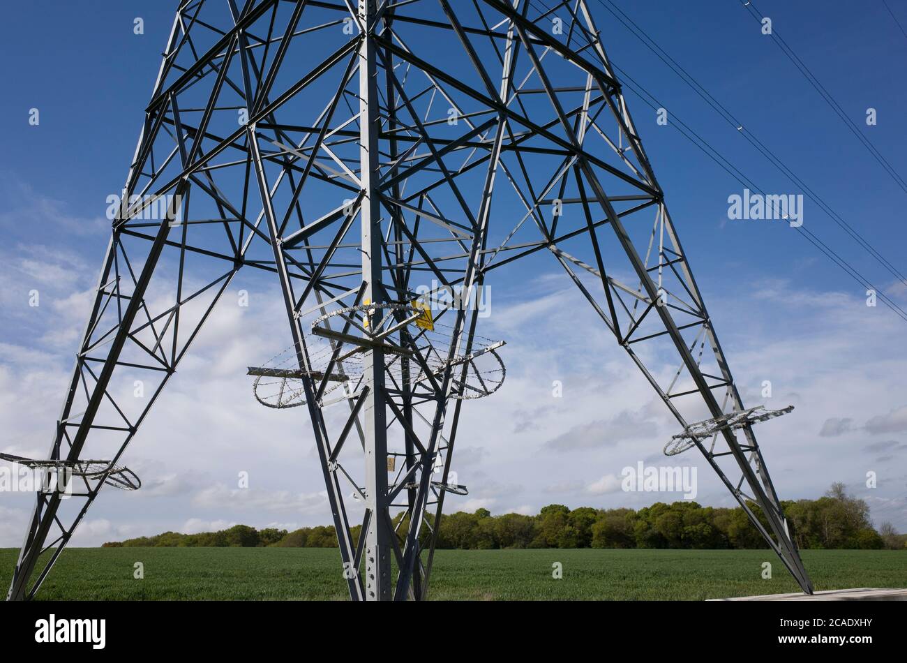 Cloudy skies with pylon hi-res stock photography and images - Alamy